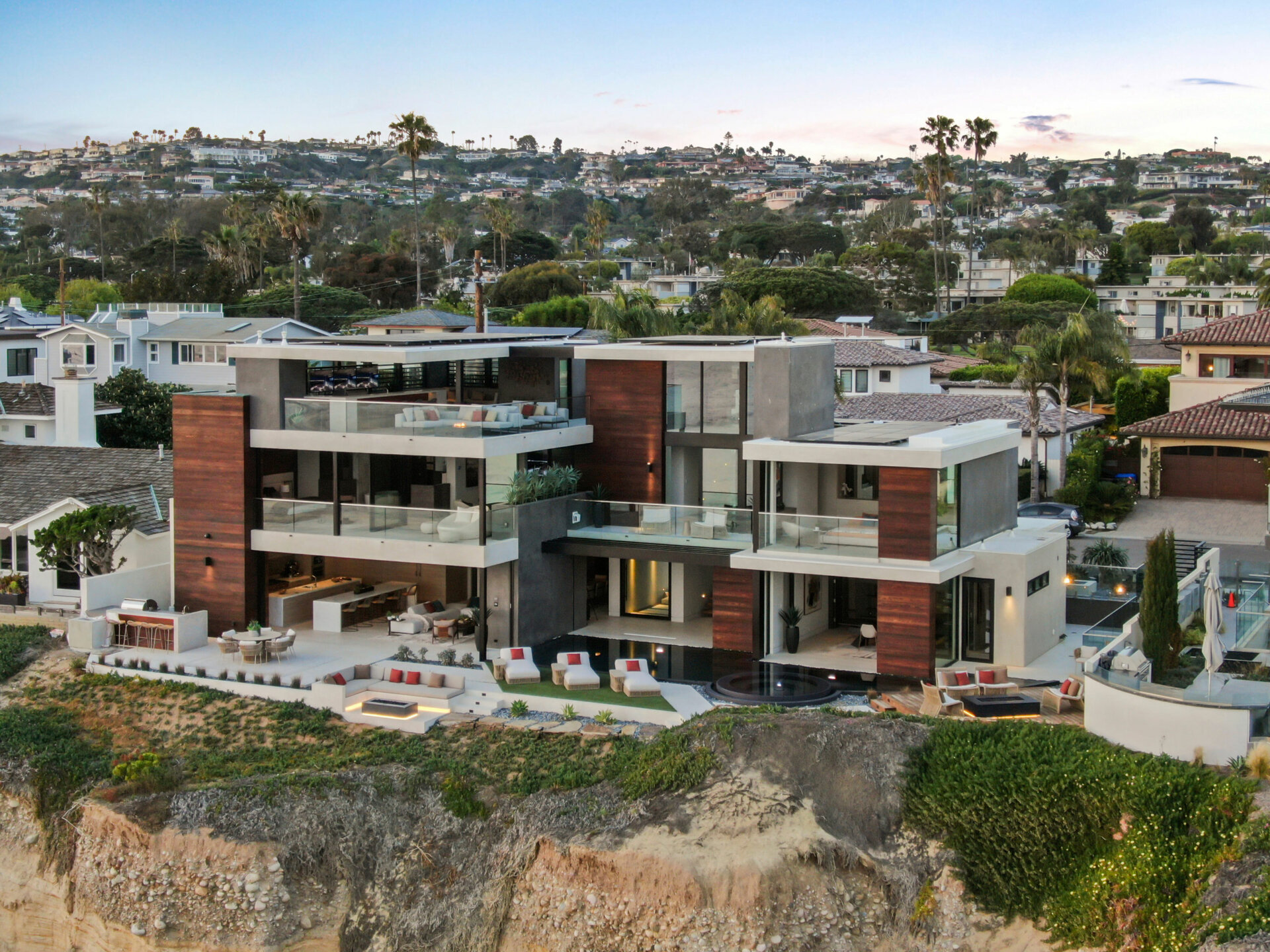 The Billionaires Collecting the World's Most Extravagant Homes